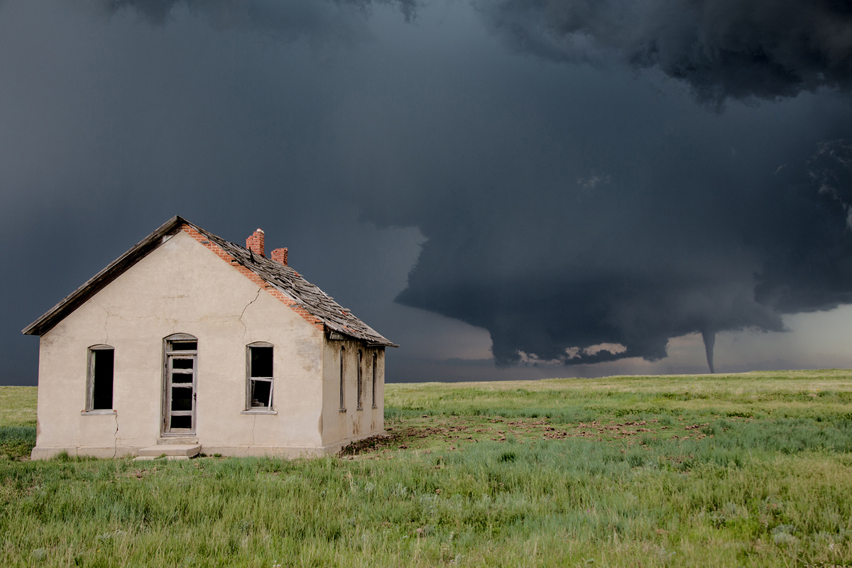 Tornado touches down behind this abandoned homestead on the Colorado ...