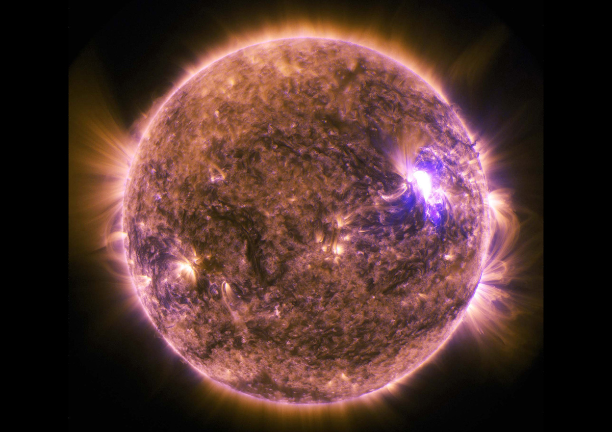 The sun emits a mid-level solar flare, an M7.9-class, peaking at 4:16 ...