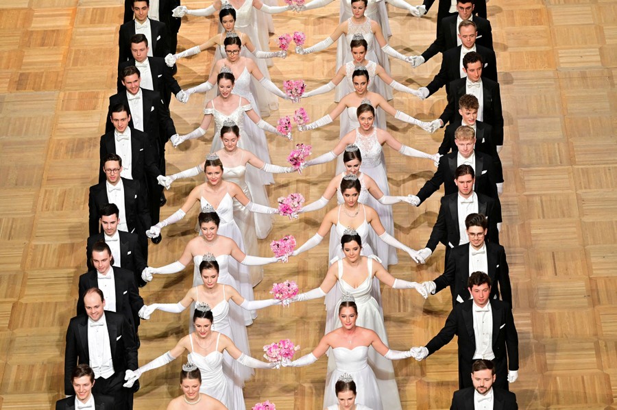 Photos of the Week: Surf Torch, Lion Dance, Pancake Race - The Atlantic