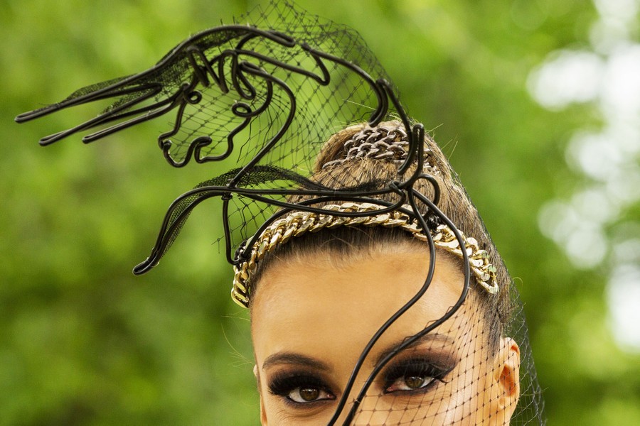 Photos of the Week: Airborne Giraffe, Horse Fascinator, Scottish ...