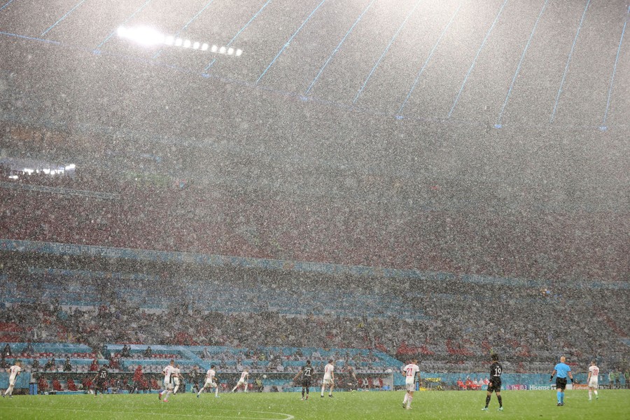 Photos of the Week: Rain Vortex, Floating Flowers, Fire Dancing - The ...