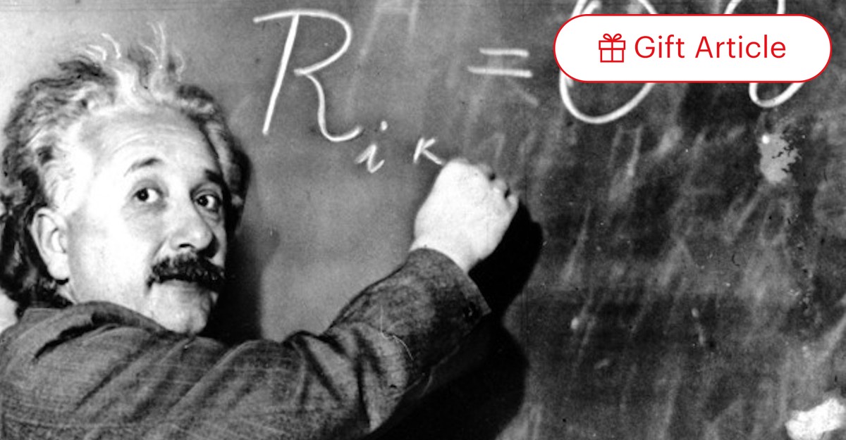 Albert Einstein Holding Nobel Prize