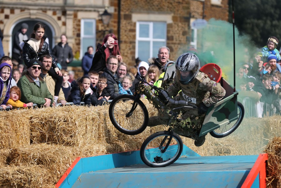 Photos of the Week: Stork Nesting, Kart Crash, Frosty Blossoms - The ...