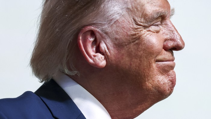 Heads, Trump wins