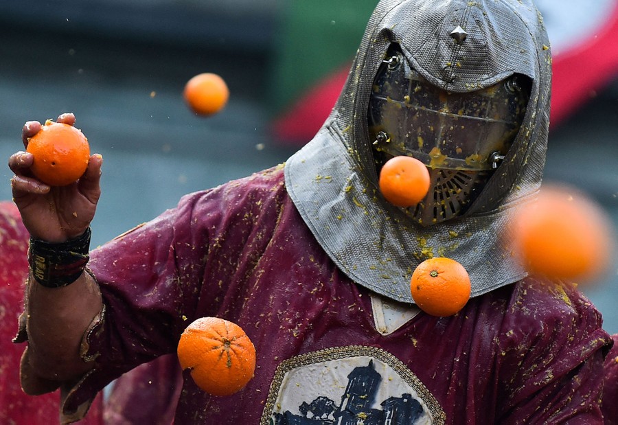 Photos of the Week: Viking Festival, Costumed Revelers, Orange Battle ...