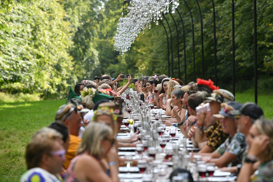 Photos of the Week: Swimming Elephant, Long Table, Bookstore Maze - The ...