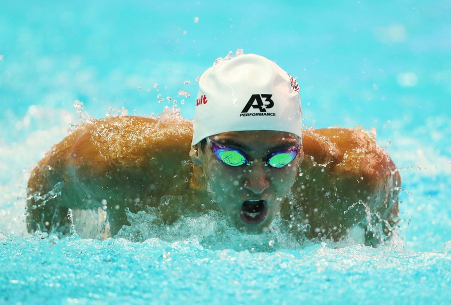 Photos of the Week: European Heat Wave, Canoe Journey, Foggy Dinner ...