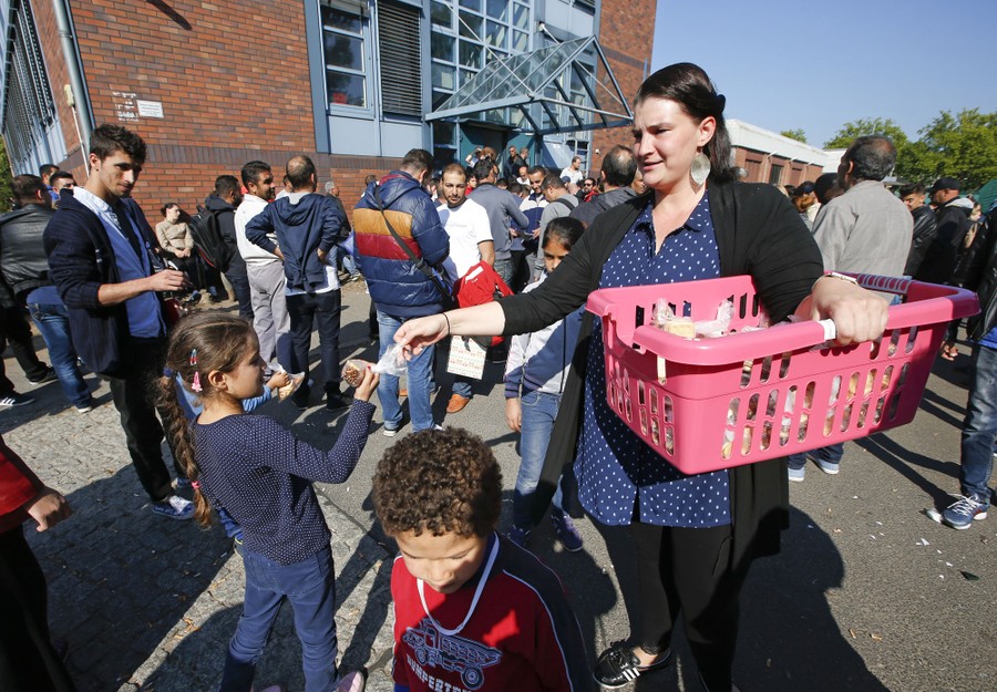 Photographs of the Volunteers Welcoming Refugees to Europe - The Atlantic