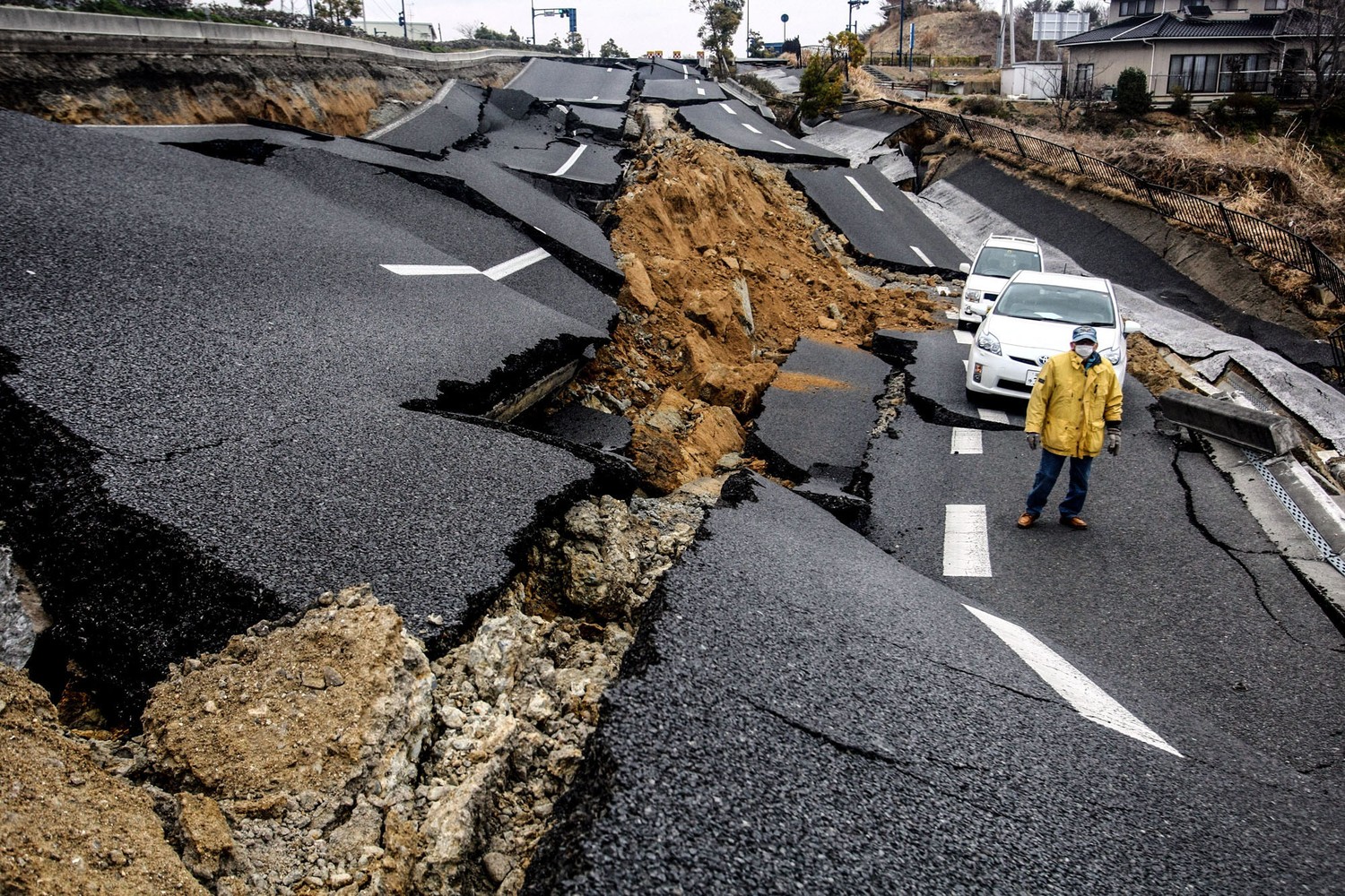 A man on destroyed street in the devastated city of Ishinomaki on April ...
