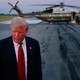 Photo of Donald Trump on a runway with a helicopter in the background