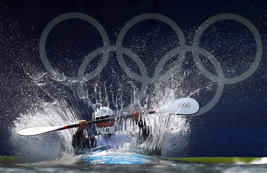 Amir Rezanejad drops in at the start of a Kayak Cross Time Trial - The ...