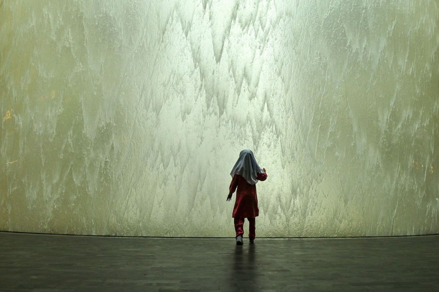 Photos of the Week: Rain Vortex, Floating Flowers, Fire Dancing - The ...