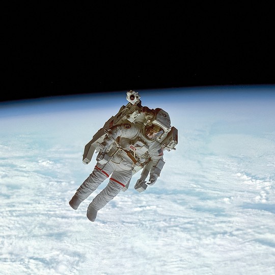 Person Floating In Outer Space