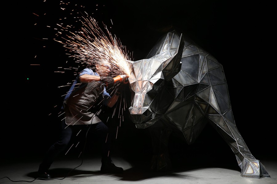 Photos of the Week: Metal Bull, First Snow, Raging Wildfires - The Atlantic