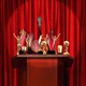 An illustration of unclaimed awards on a podium