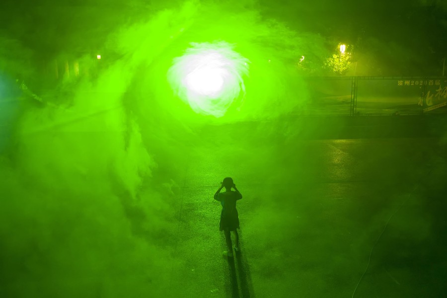 Photos of the Week: Stari Most, Flaming Jet, Hug Kit - The Atlantic